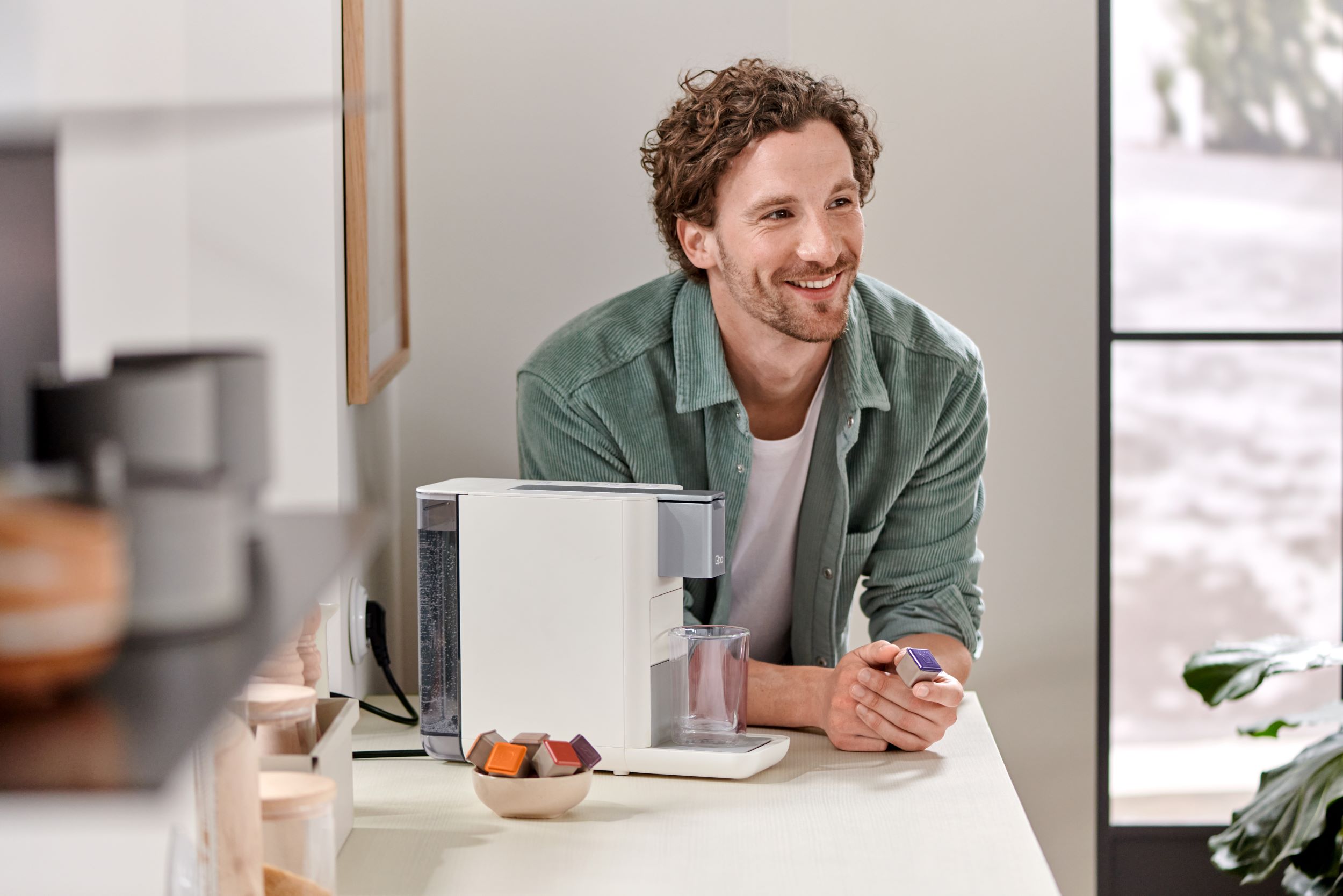 Wie reinige und entkalke ich meine Qbo ESSENTIAL? - Tchibo